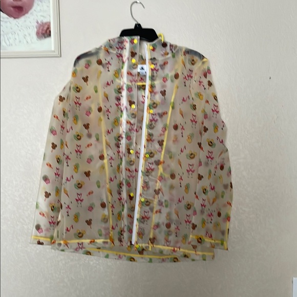 Disney | Jackets & Coats | Disney Floral Transparent Cape With Yellow ...